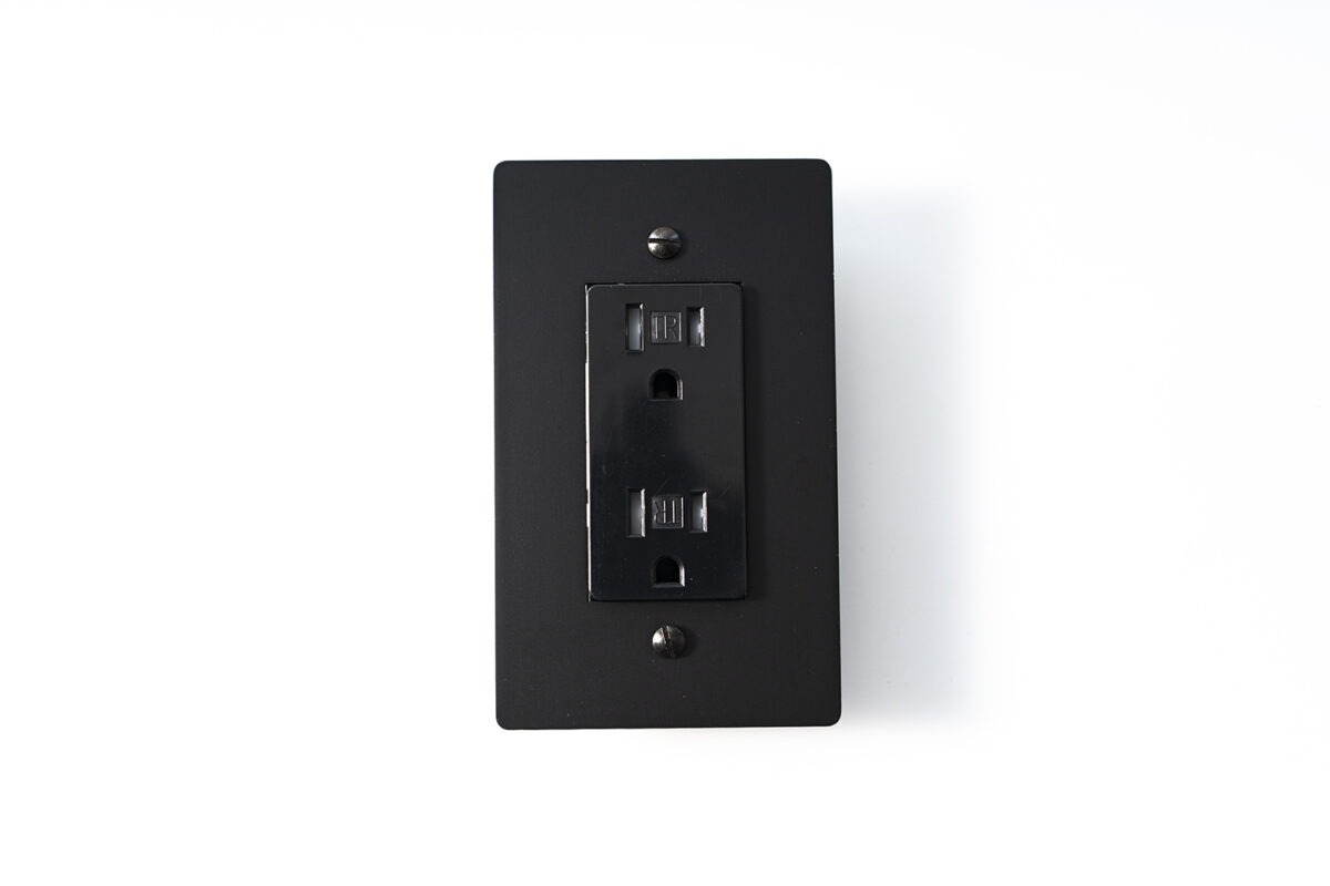 Electrical Outlet in Solid Black Brass Wall Plate | Getswitches.com