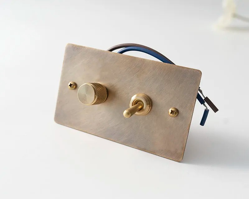 Vintage Charm: Aged Brass Panel Retro Toggle Light Switch